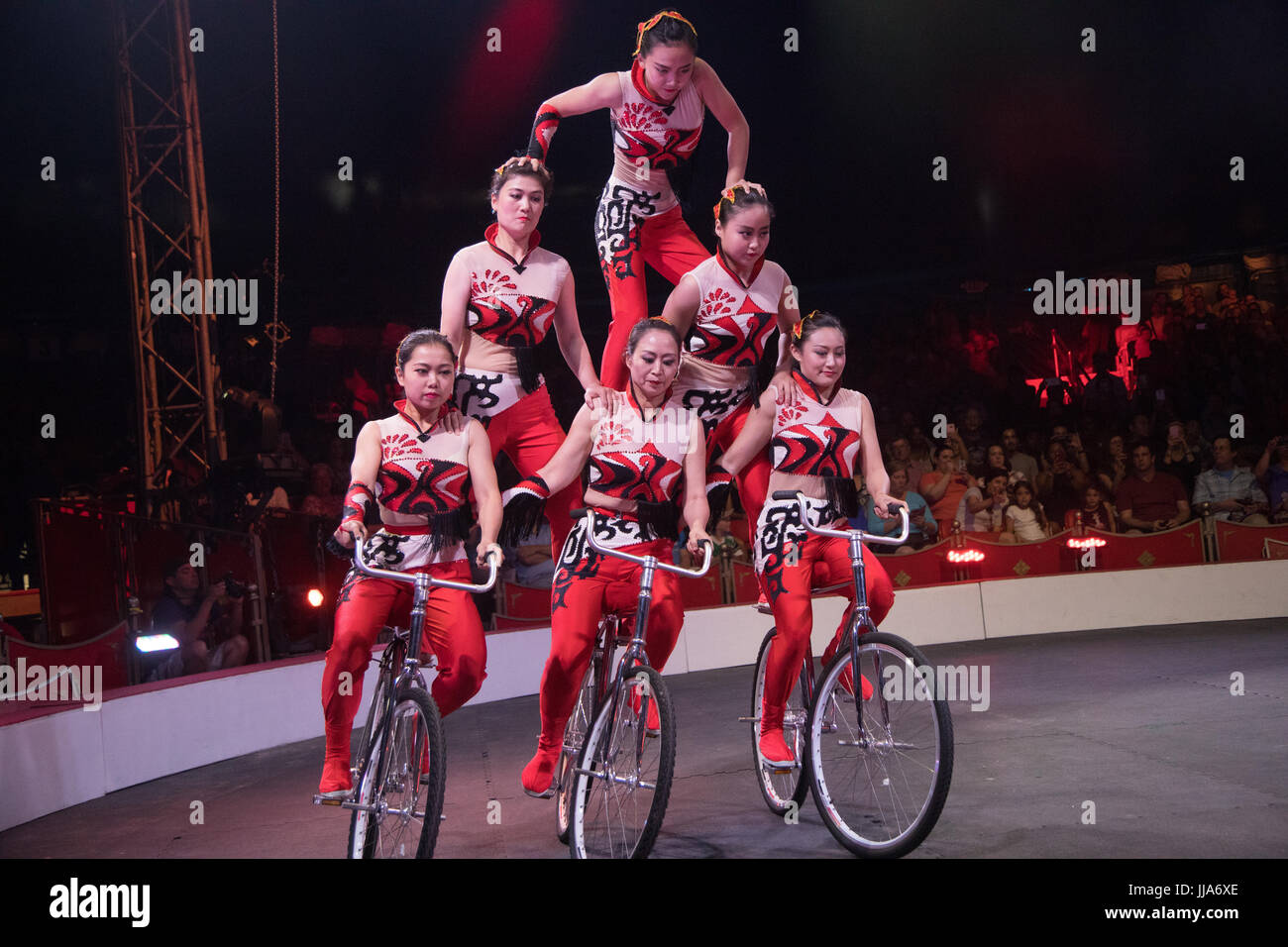 Chinese acrobats on bicycles perform with the UniverSoul Circus ...