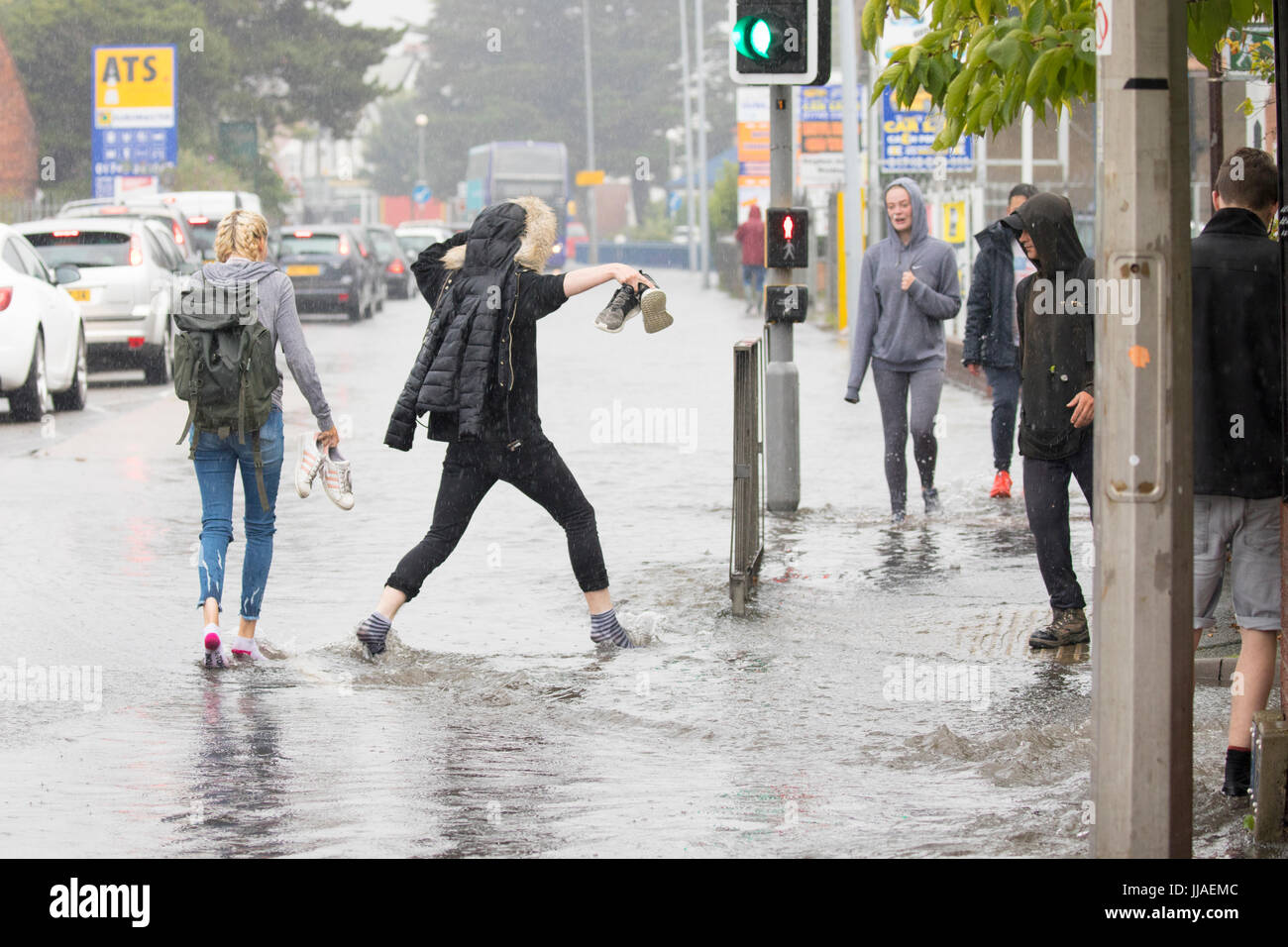 People Walk Through Flooded Street High Resolution Stock Photography ...