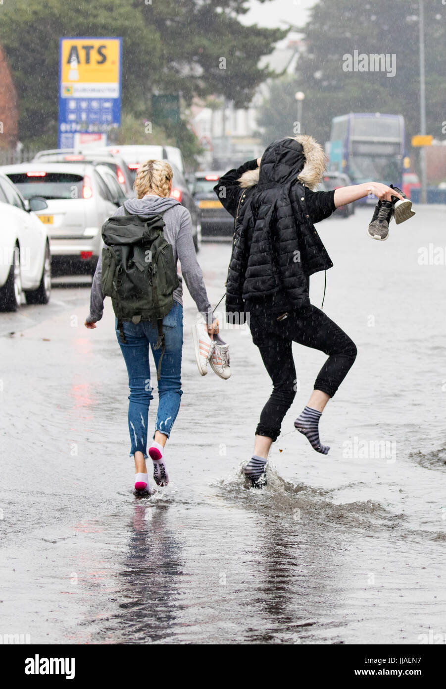 People Walk Through Flooded Street High Resolution Stock Photography ...