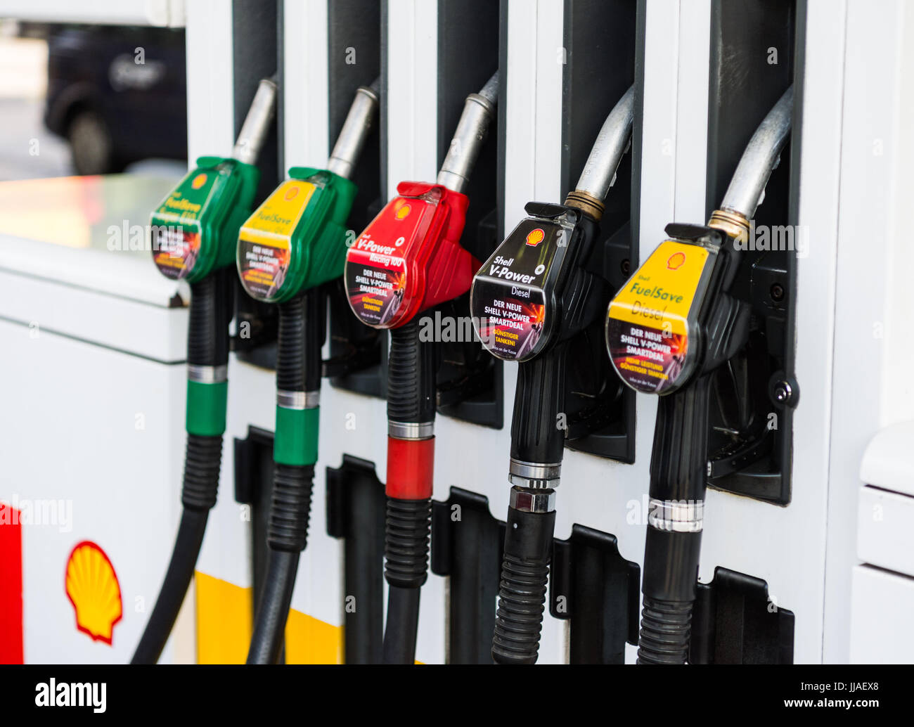 A petrol pump can be seen at a Shell petrol station in Hamburg, Germany ...