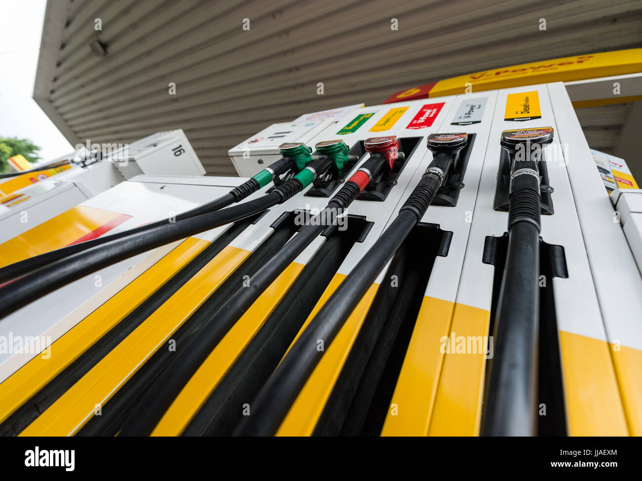 A petrol pump can be seen at a Shell petrol station in Hamburg, Germany ...
