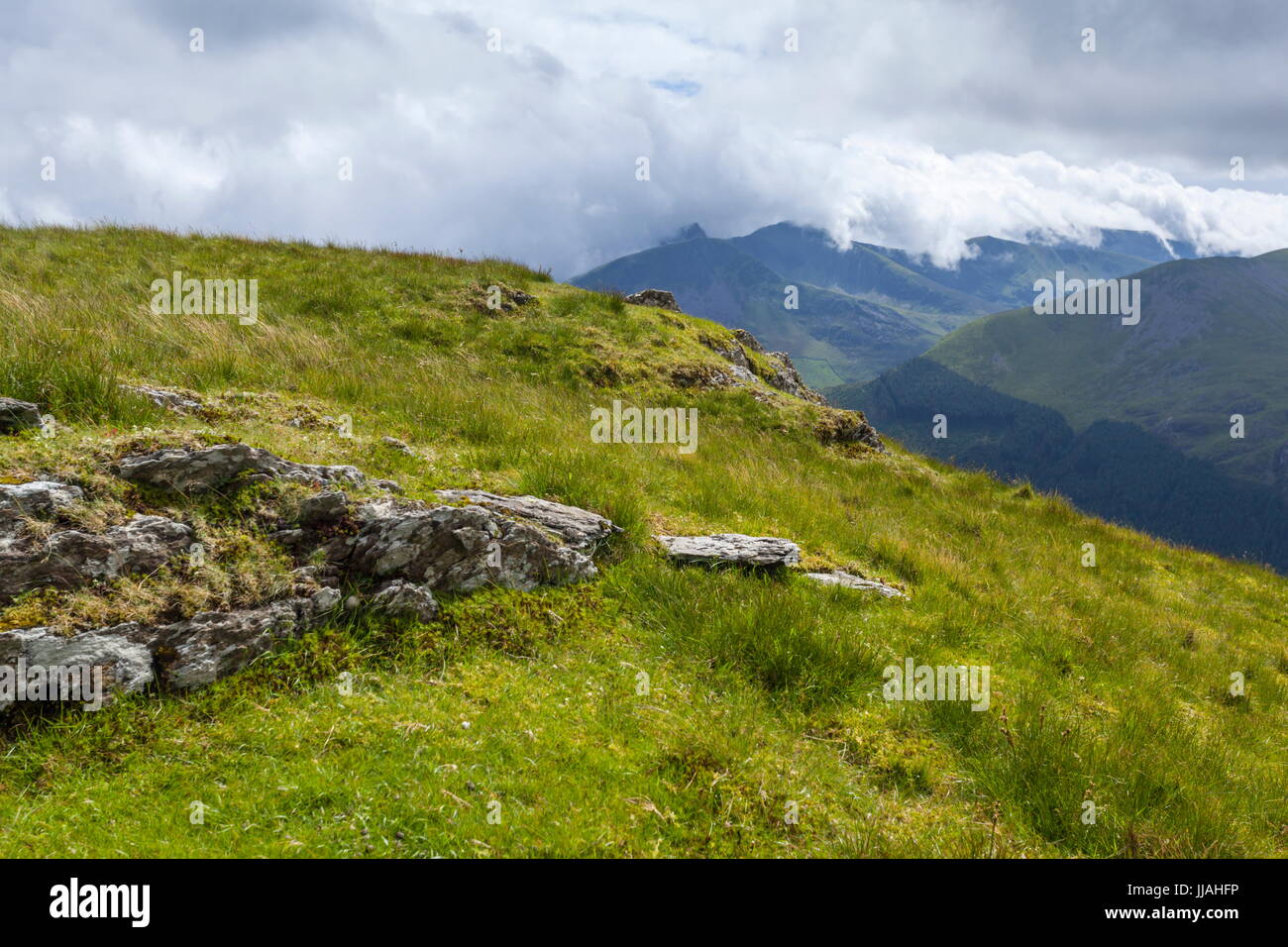 Seen from Foel Goch clouds are seen obscuring the summits of the ...