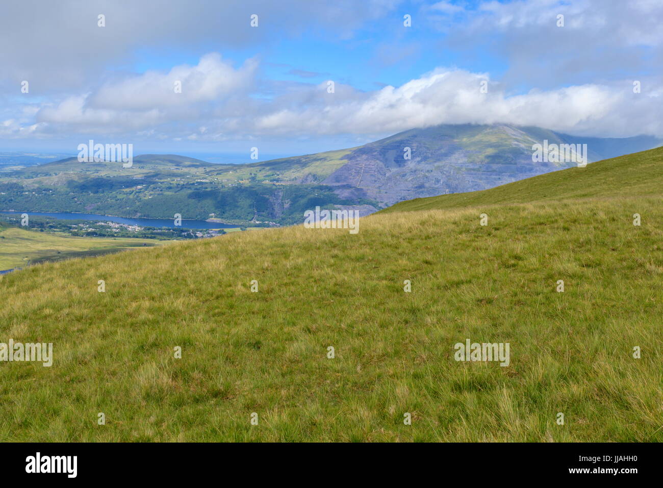 A cloud covered Elidir Fawr stands above Dinorwic slate quarry and ...