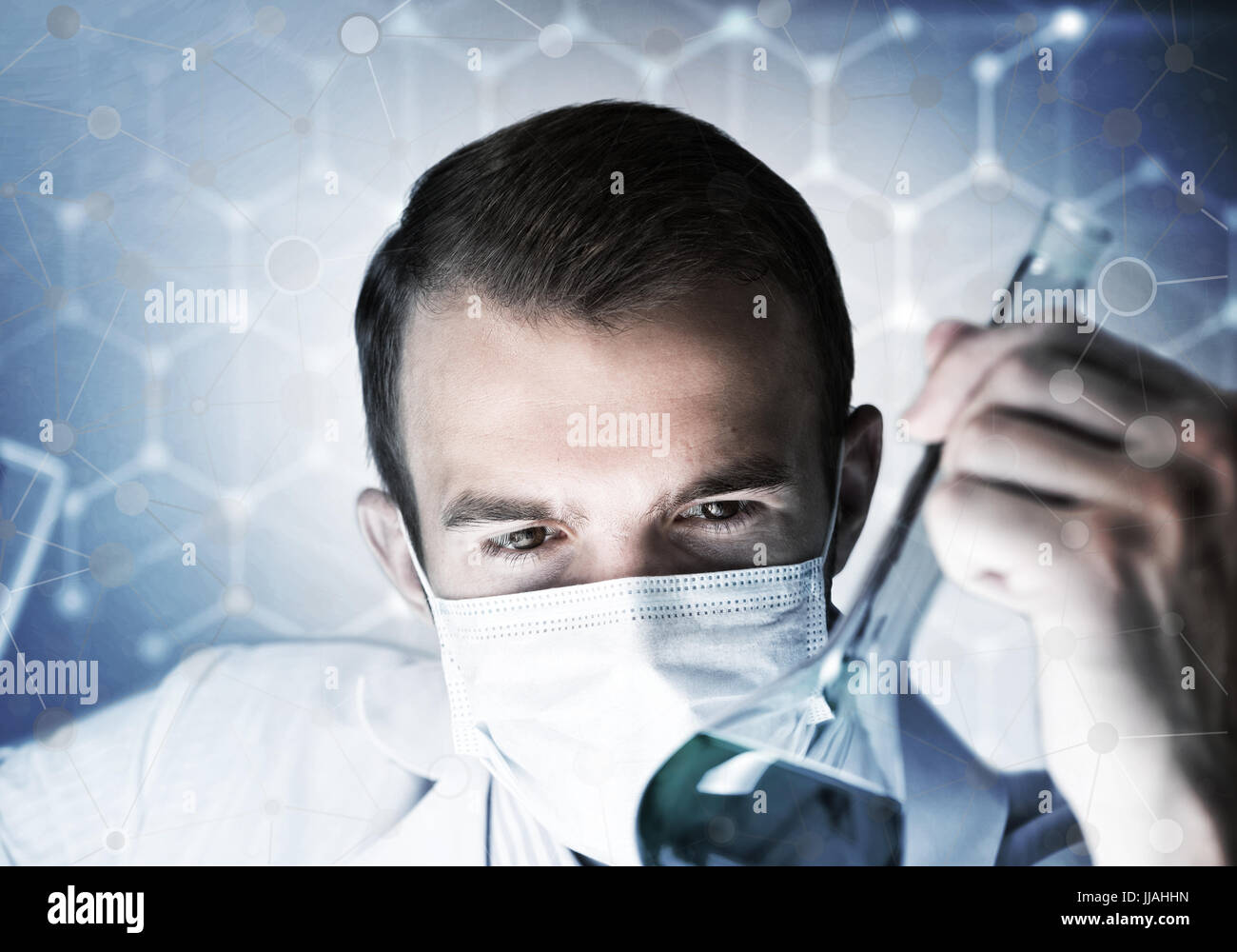 Portrait of concentrated male scientist working with reagents in laboratory Stock Photo - Alamy