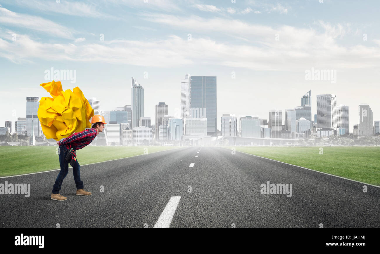Engineer man carry load Stock Photo - Alamy