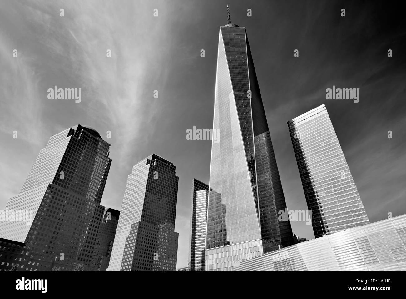 One World Trade Center skyscraper surrounded by glass buildings, black ...