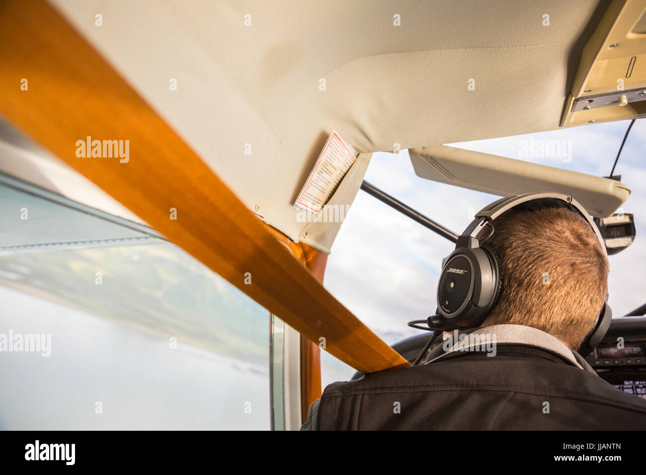 Pilot in a Cockpit of a small plane, Alaska, USA Stock Photo - Alamy