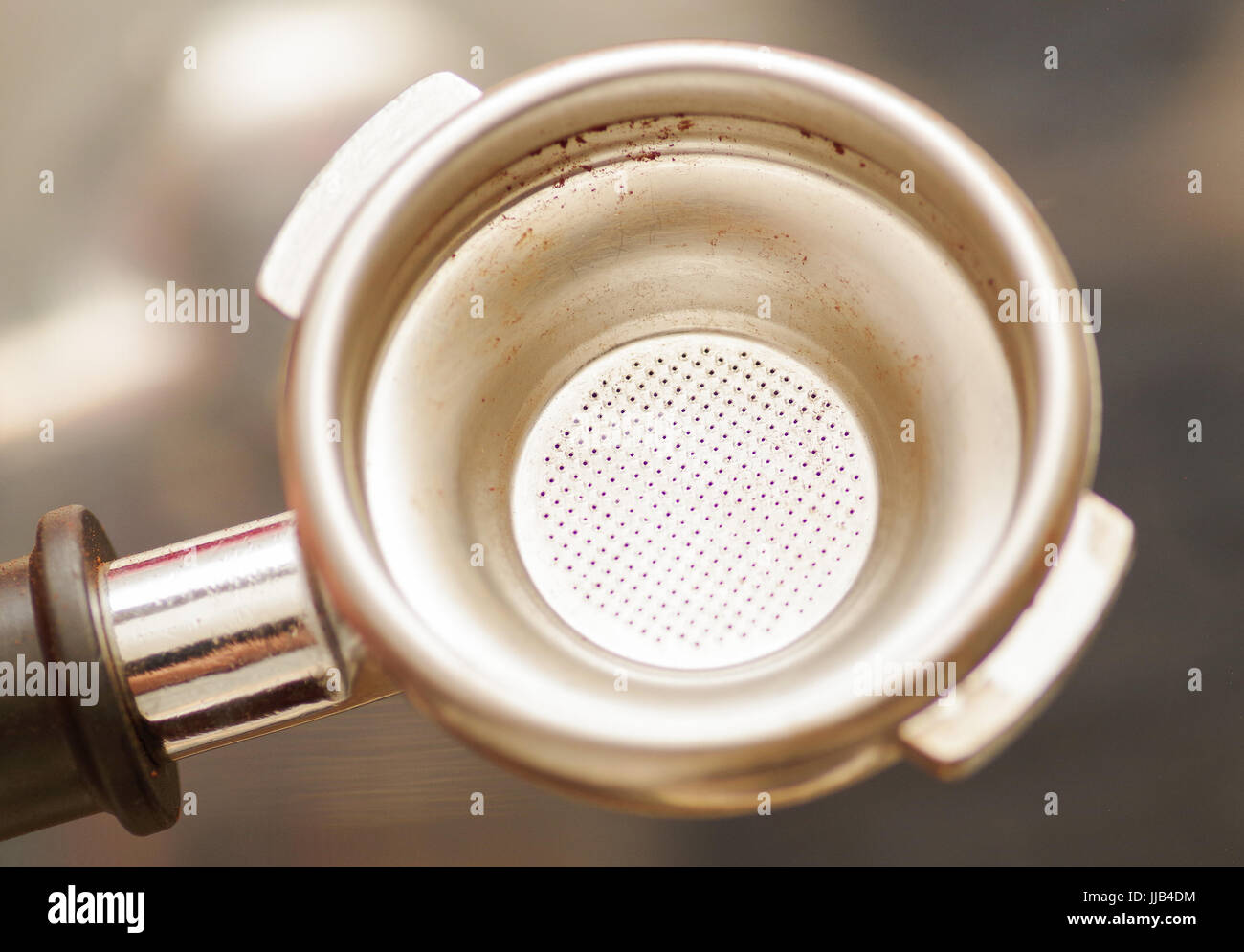 Close up of coffee strainer, in a blurred background Stock Photo - Alamy