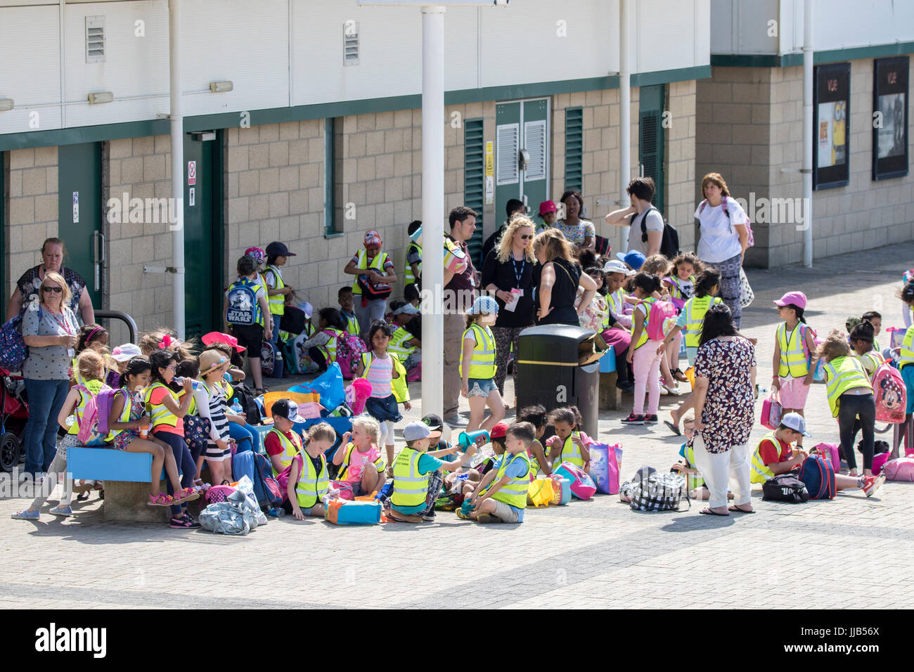 A group of school children wearing hi-viz on a visit to Southport ...