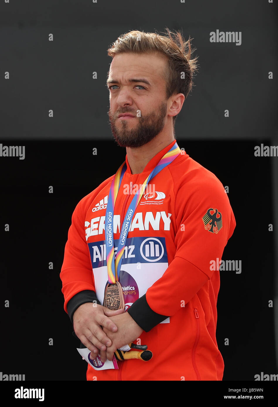 Germany's Mathias Mester with his bronze medal for Men's F41 Javelin ...