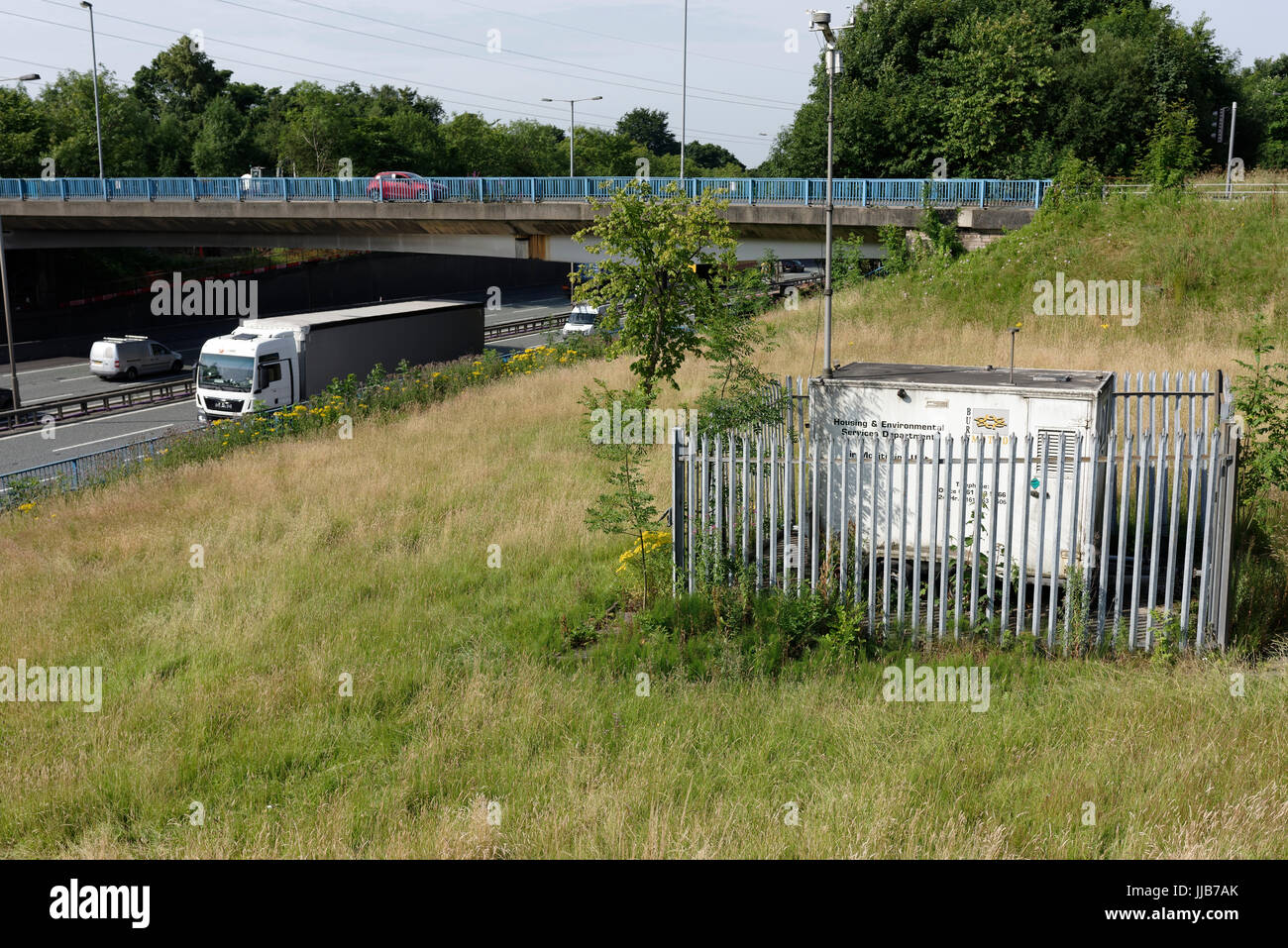 Pollution monitor, Air monitoring unit on M60 motorway embankment j17 ...