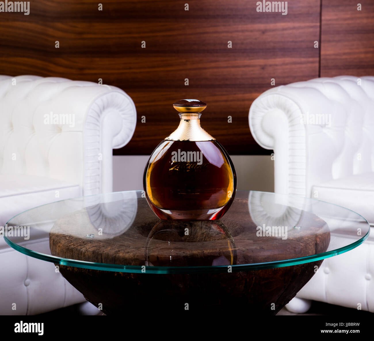 Luxury interior, high class lounge with top end rum and leather chairs ...