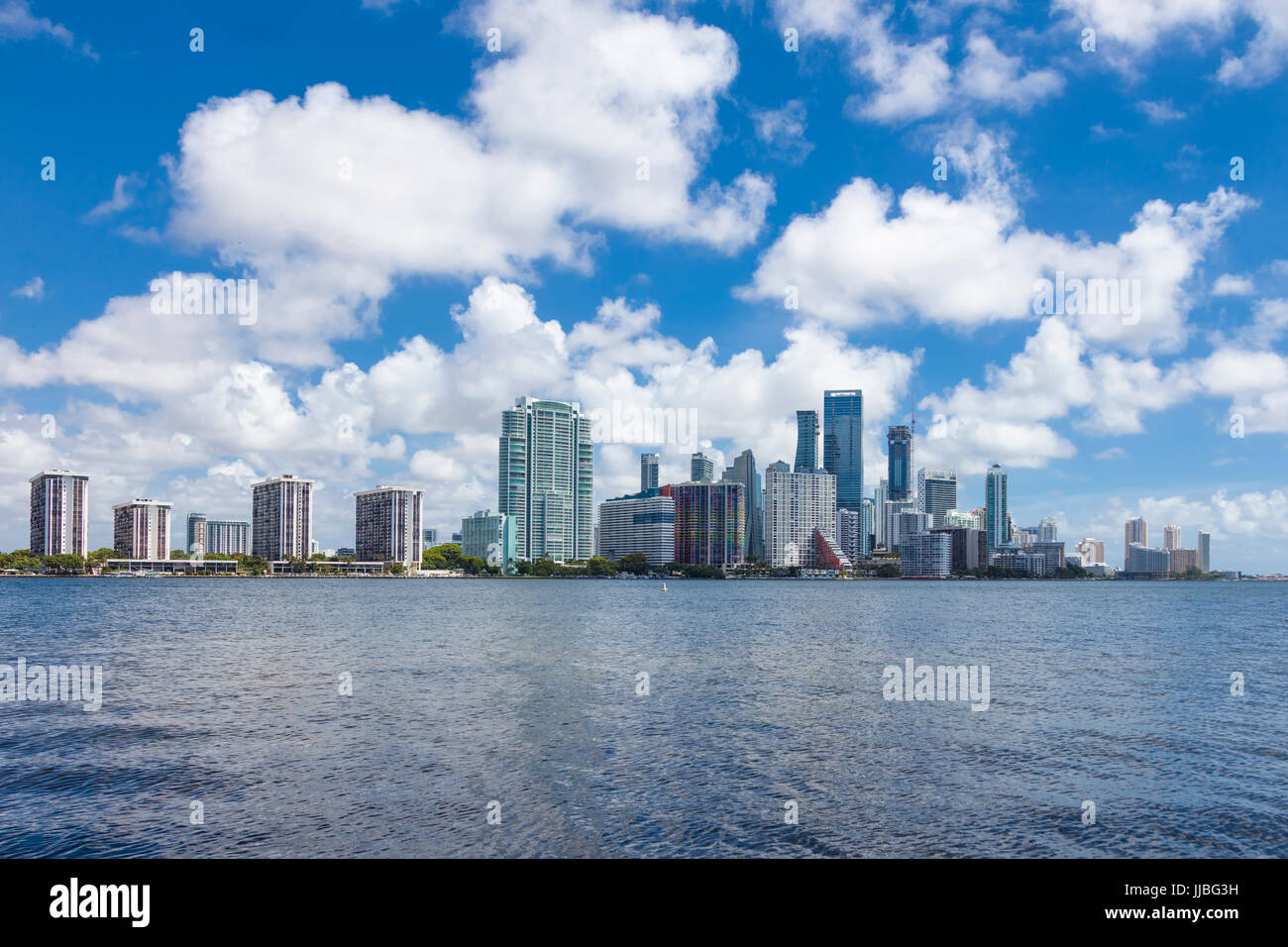 Miami Florida skyline on a sunny blue sky white cloud day Stock Photo ...
