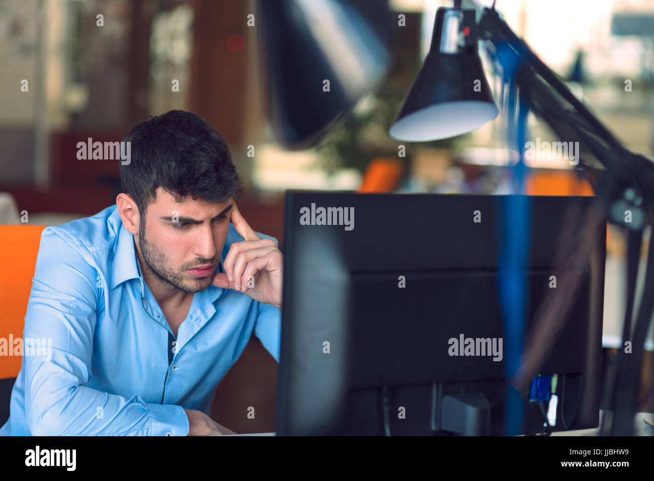 Freelance programmer working in startup office Stock Photo - Alamy