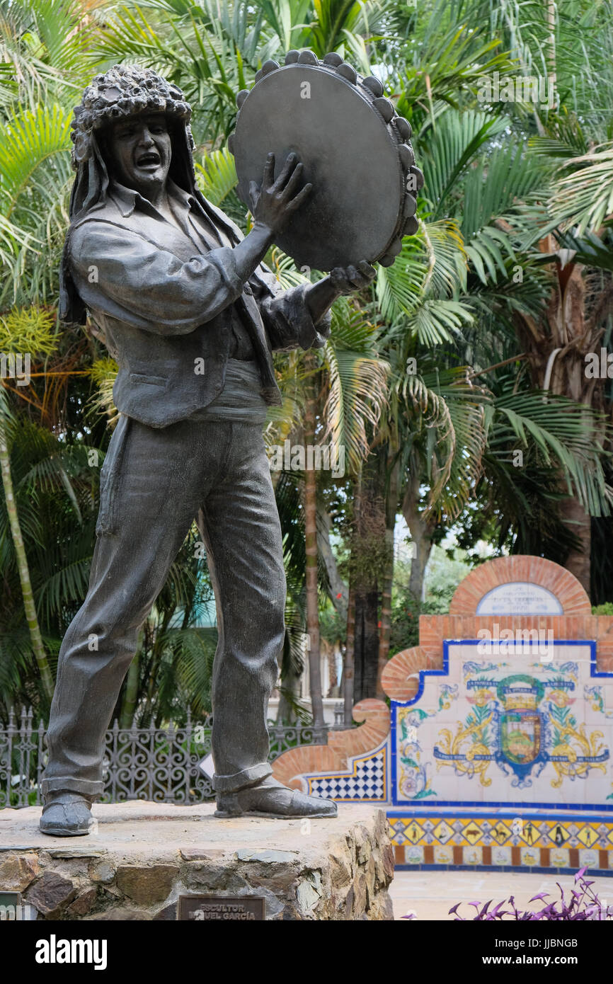 MALAGA, ANDALUCIA/SPAIN - JULY 5 : Statue of Man Holding a Tamborine by ...