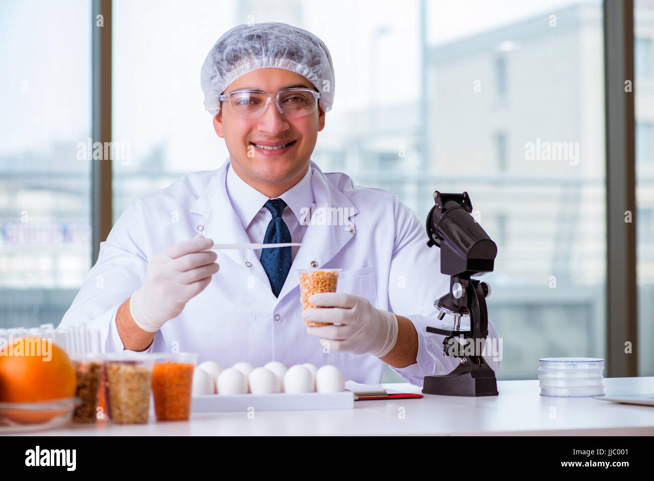 Nutrition expert testing food products in lab Stock Photo - Alamy