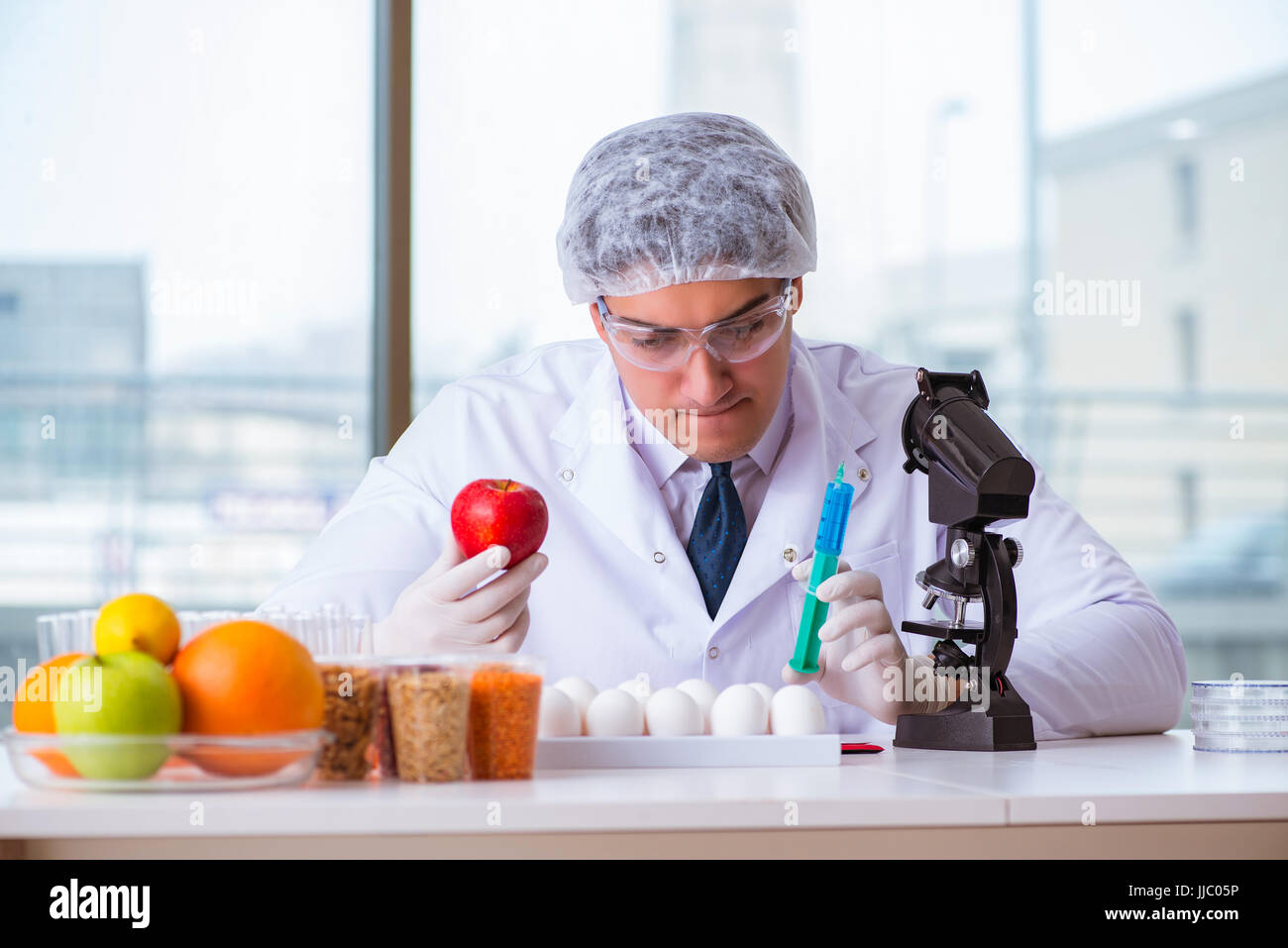 Nutrition expert testing food products in lab Stock Photo - Alamy