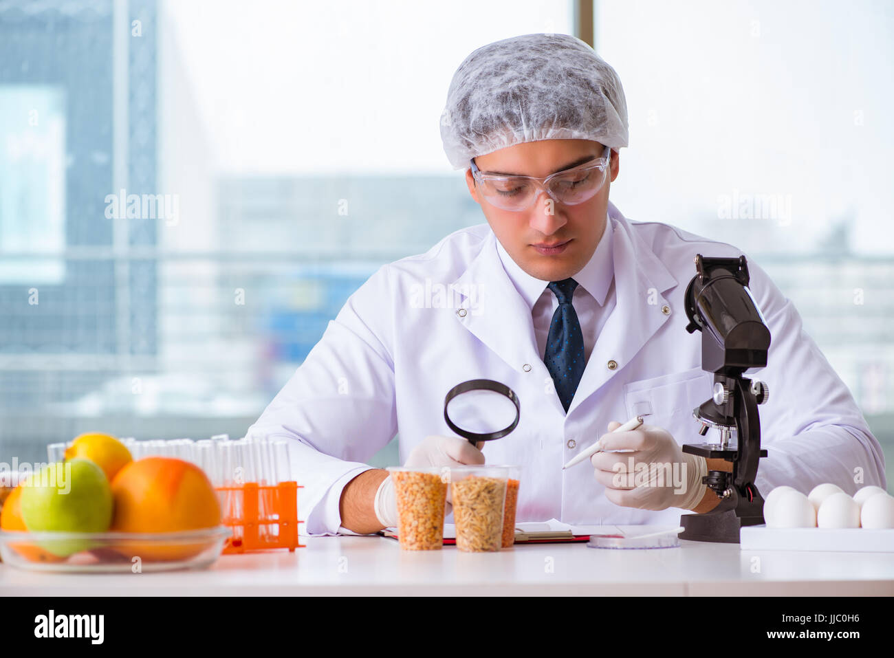 Nutrition expert testing food products in lab Stock Photo - Alamy