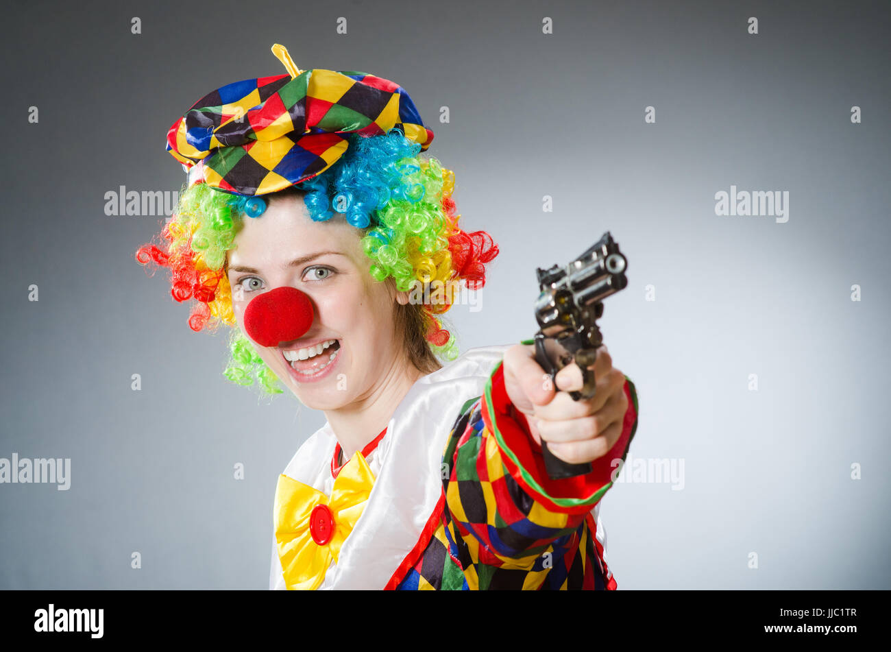 Funny clown in comical concept Stock Photo - Alamy