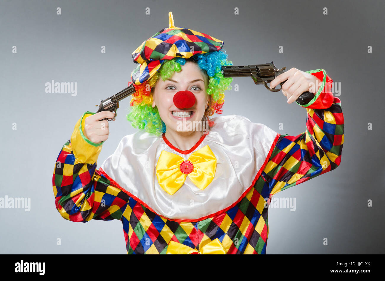 Funny clown in comical concept Stock Photo - Alamy