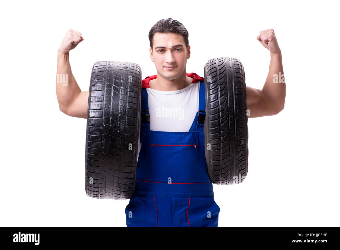 Superhero man with tyre isolated white background Stock Photo - Alamy