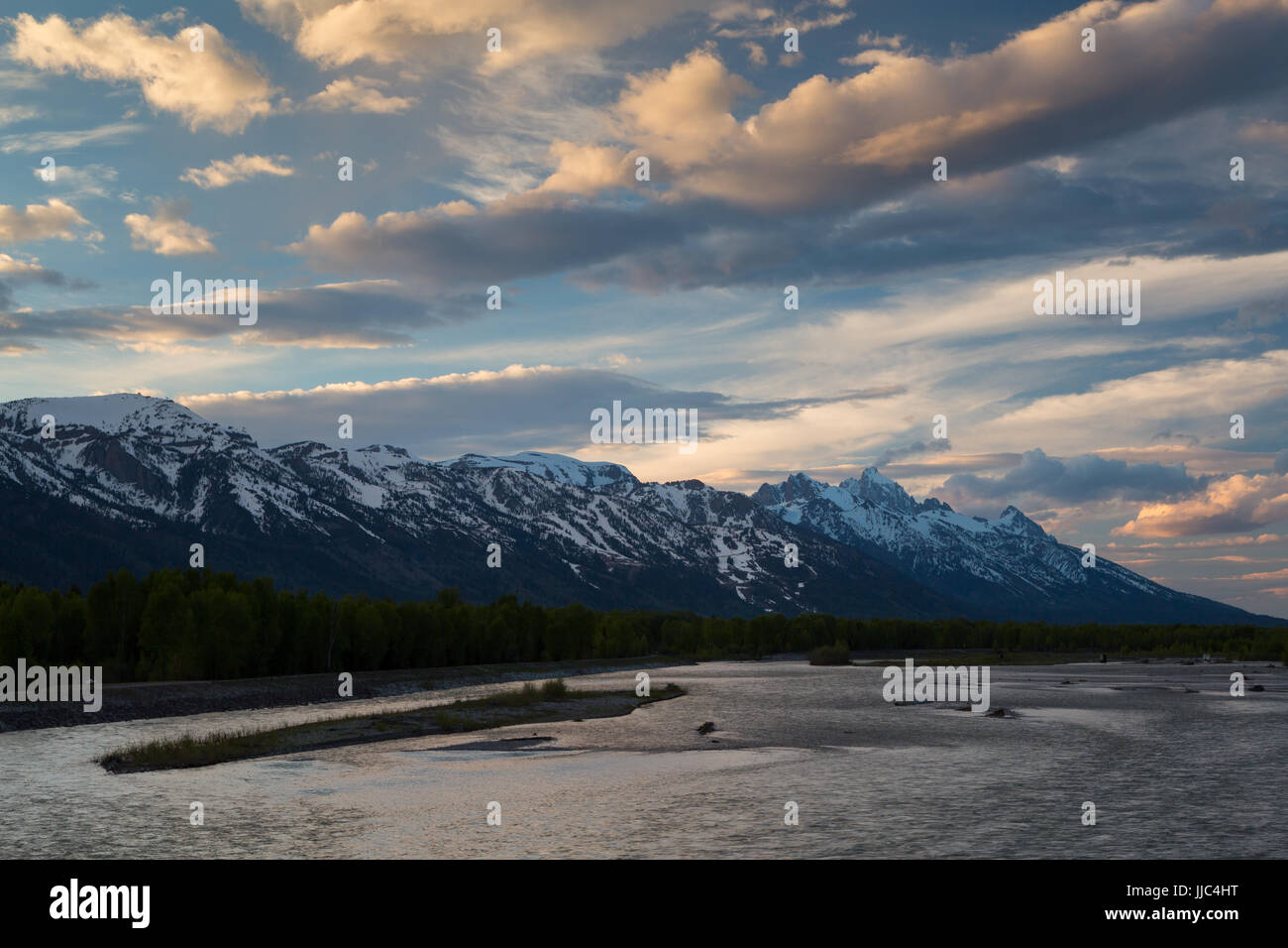 Clearing storms in springtime skies lit up at sunset above the Snake ...