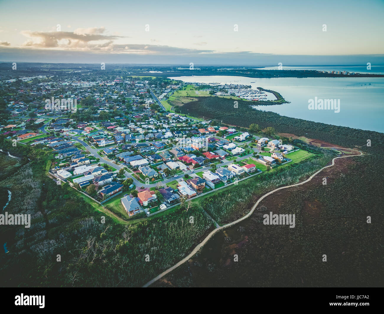 Aerial view of Hastings suburb and Westernport Marina at dusk ...