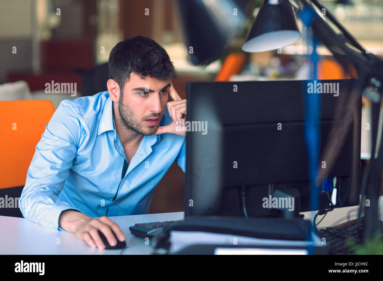 Freelance programmer working in startup office Stock Photo - Alamy
