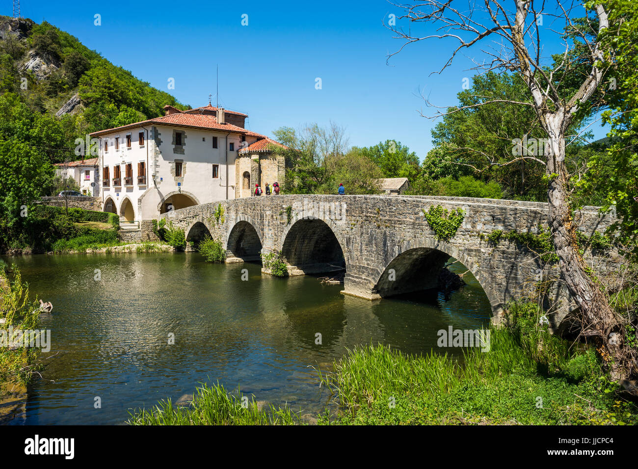 medieval bridge over river Ulzama,Villava, Spain, Basque country ...