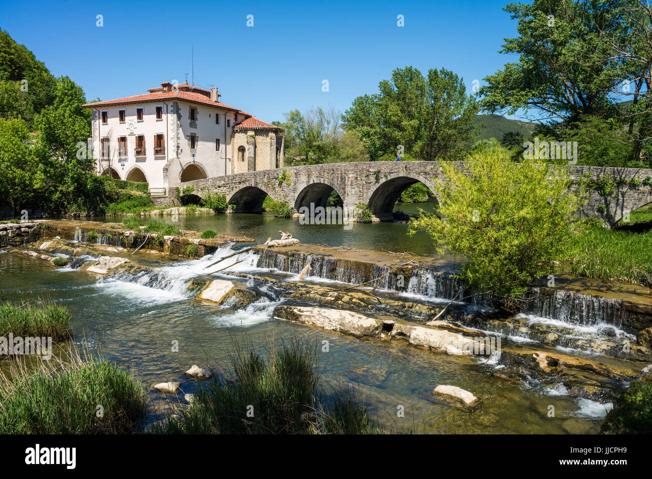 medieval bridge over river Ulzama,Villava, Spain, Basque country ...