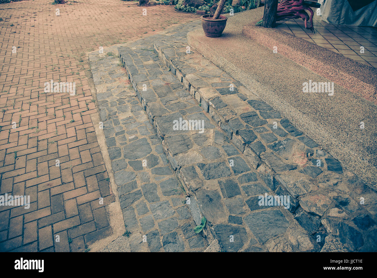 Ancient red brick footpath background walk way. vintage tone with ...