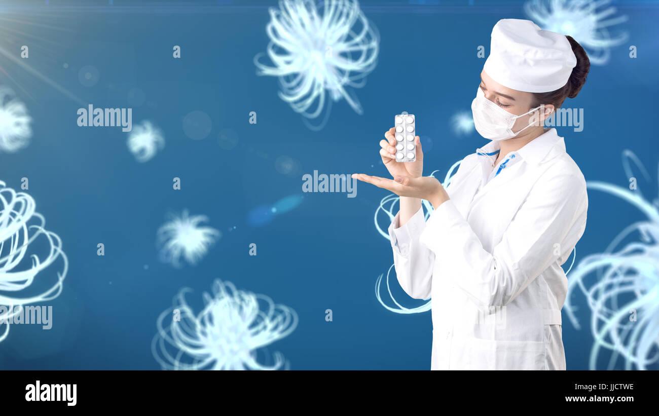 Beautiful medical woman doctor in uniform. Studio painted background ...