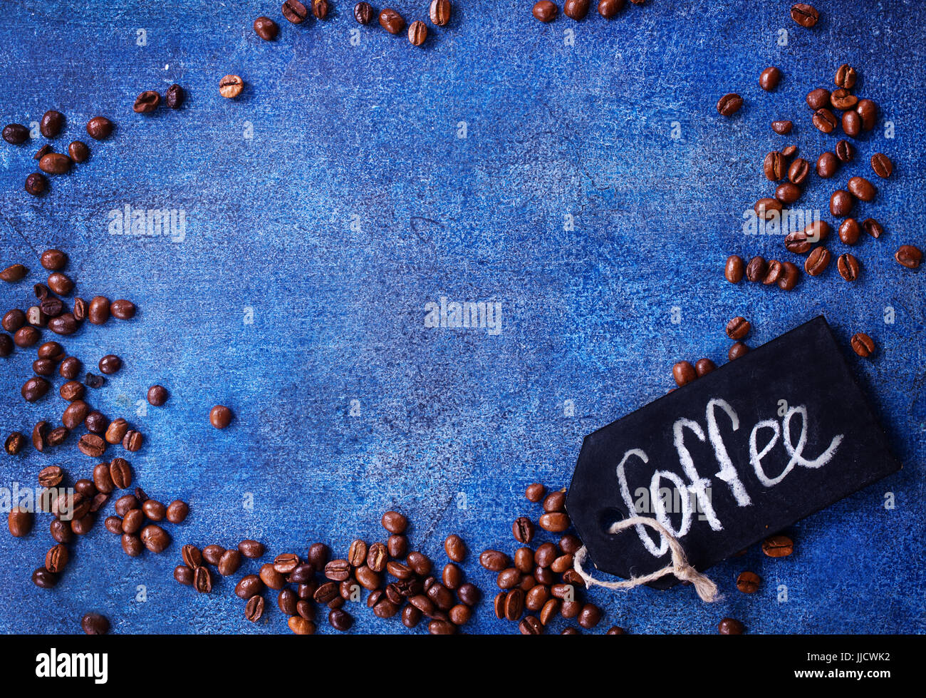 coffee beans on a table, coffee background Stock Photo - Alamy