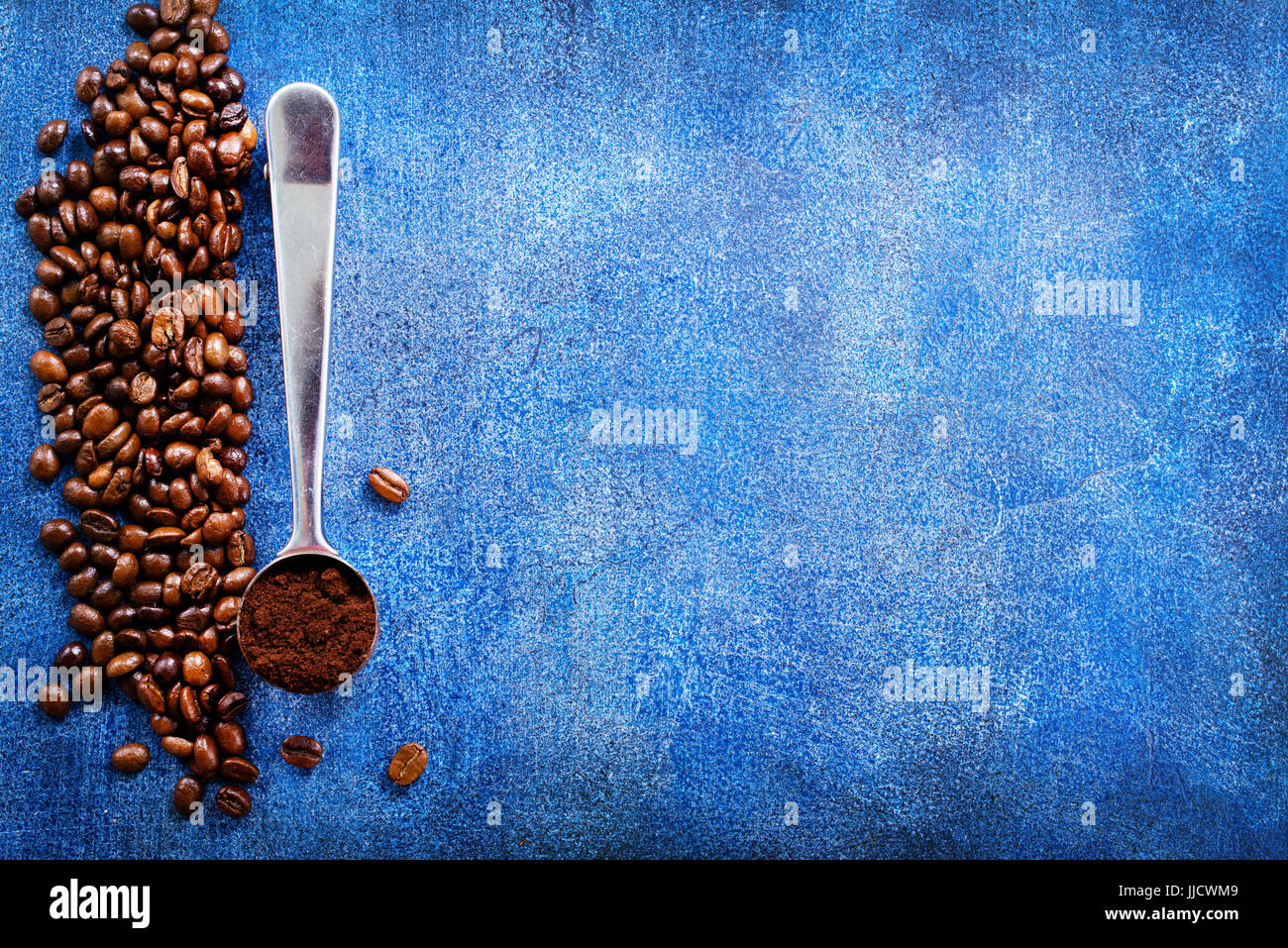 coffee beans on a table, coffee background Stock Photo - Alamy