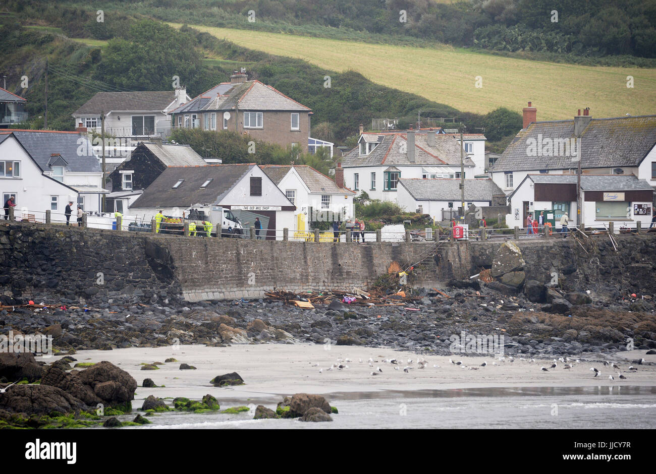 After intense rain caused flash flooding in the coastal village hi-res ...