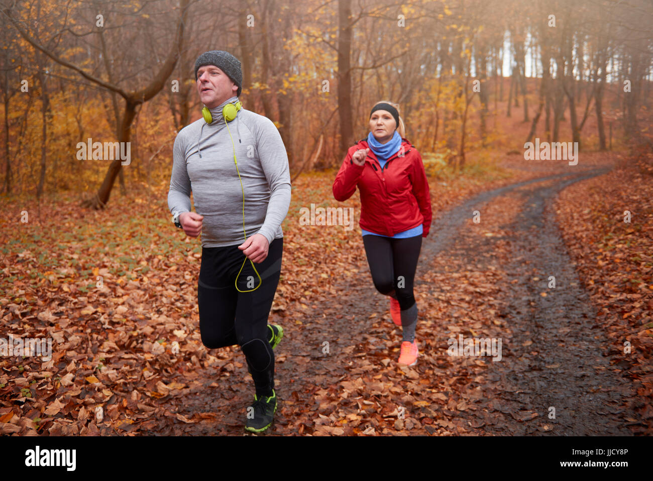 Older couple having training outside Stock Photo - Alamy