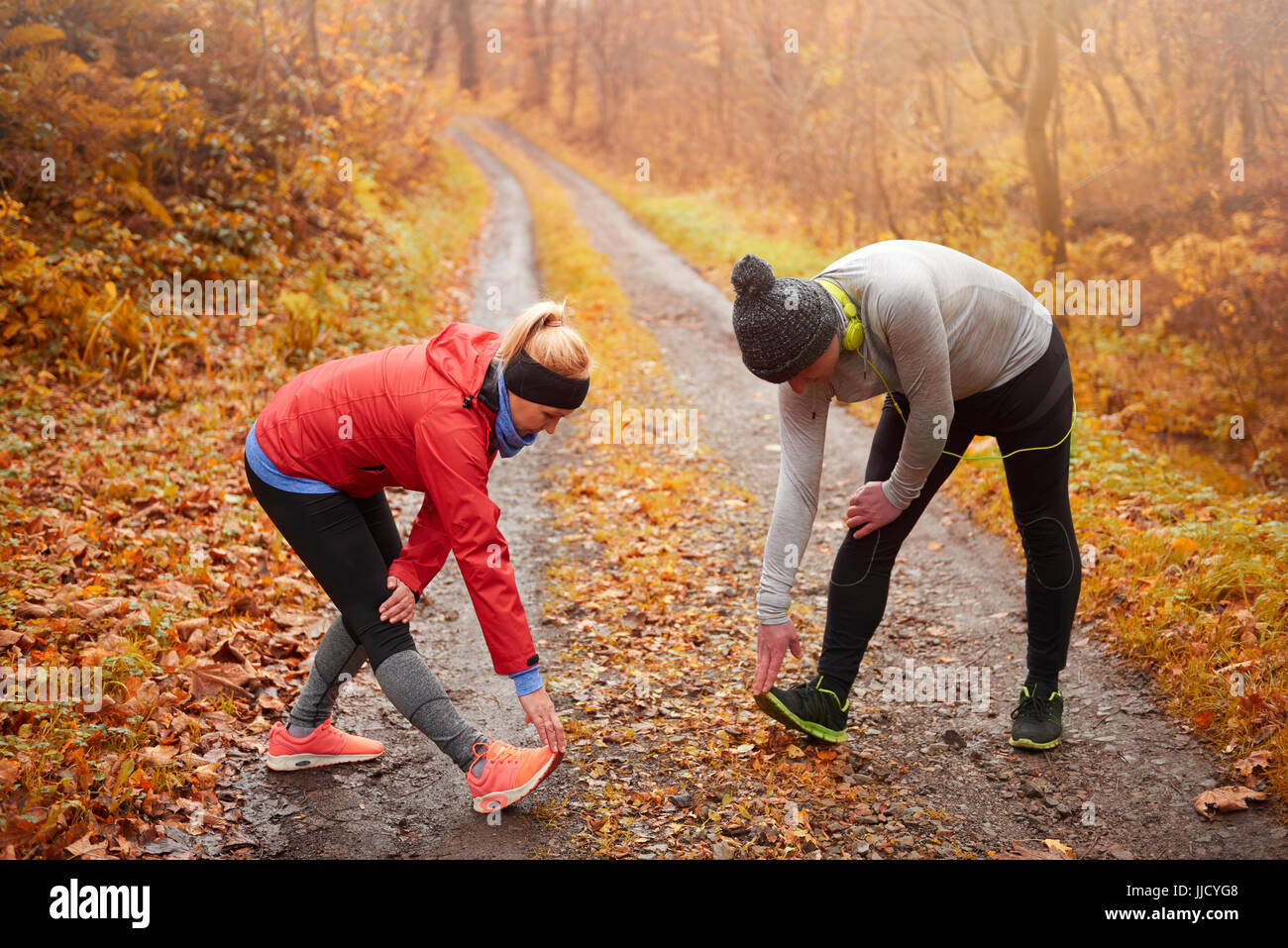 Senior couple doing exercises in nature Stock Photo - Alamy