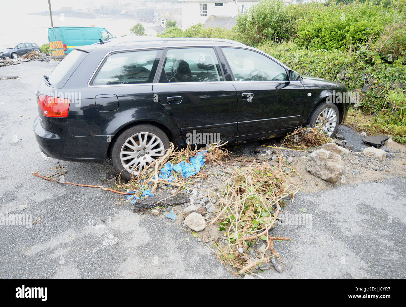 After intense rain caused flash flooding in the coastal village hi-res ...