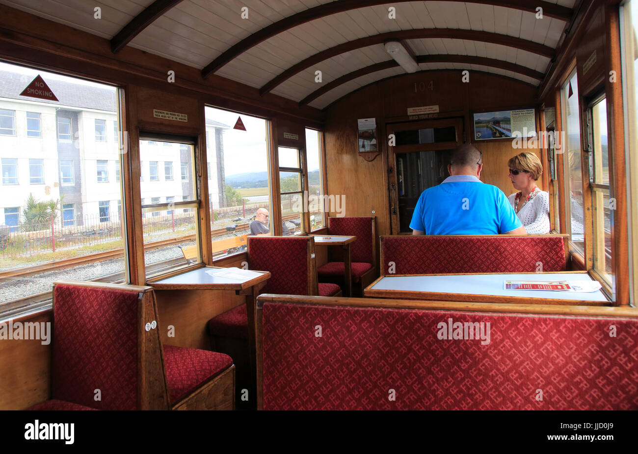 Passengers inside train carriage of Ffestiniog railway, Gwynedd, north west Wales, UK Stock ...