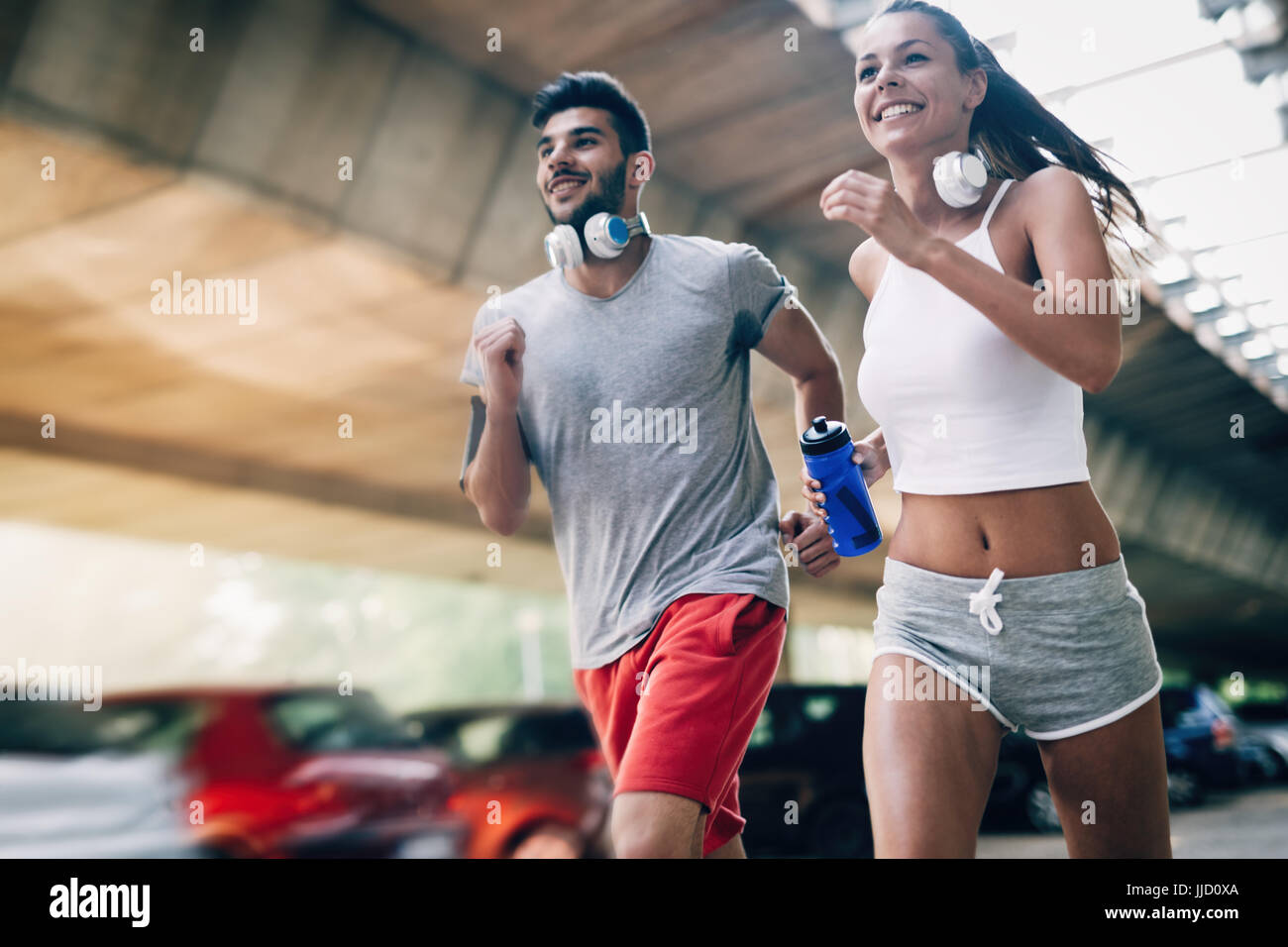 Running together hi-res stock photography and images - Alamy