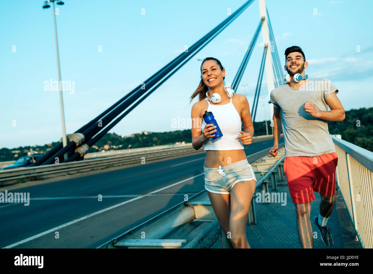 Couple running together man woman hi-res stock photography and images ...