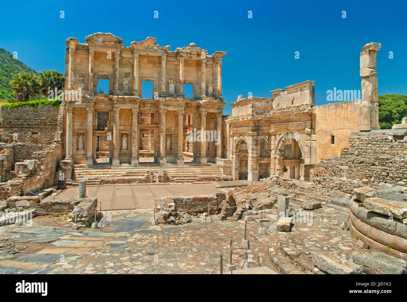 UNESCO heritage site Celsus library facade in Ephesus on sunny day with ...