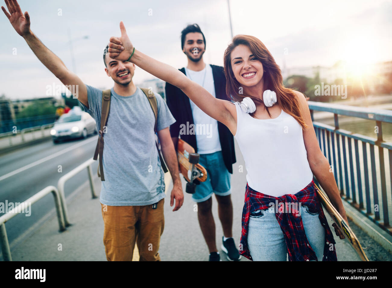 Group of happy friends hang out together Stock Photo - Alamy