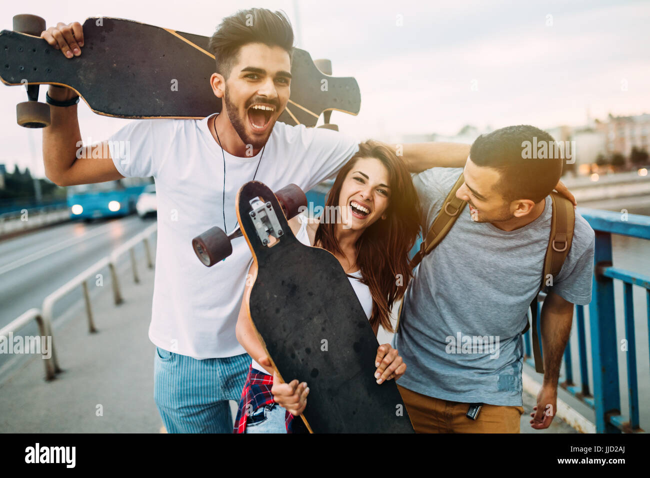 Group of happy friends hang out together Stock Photo - Alamy
