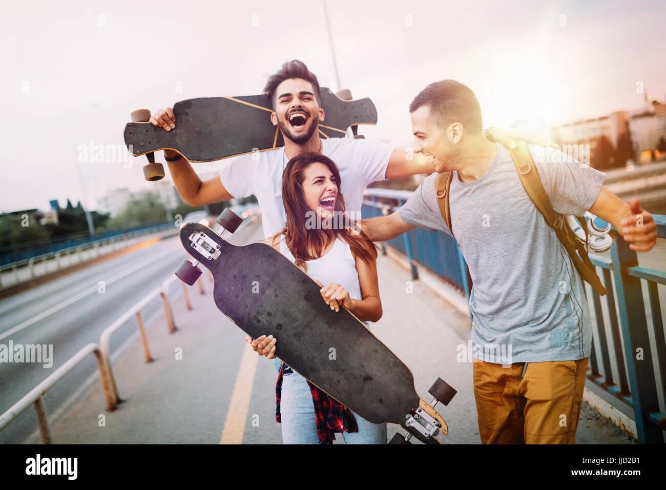 Group of happy friends hang out together Stock Photo - Alamy