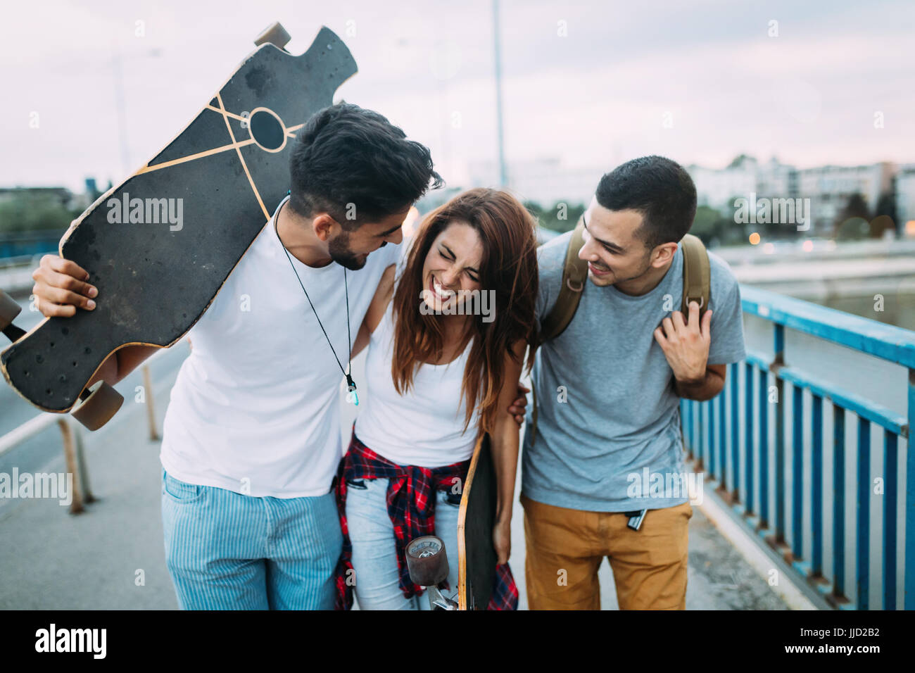 Group of happy friends hang out together Stock Photo - Alamy