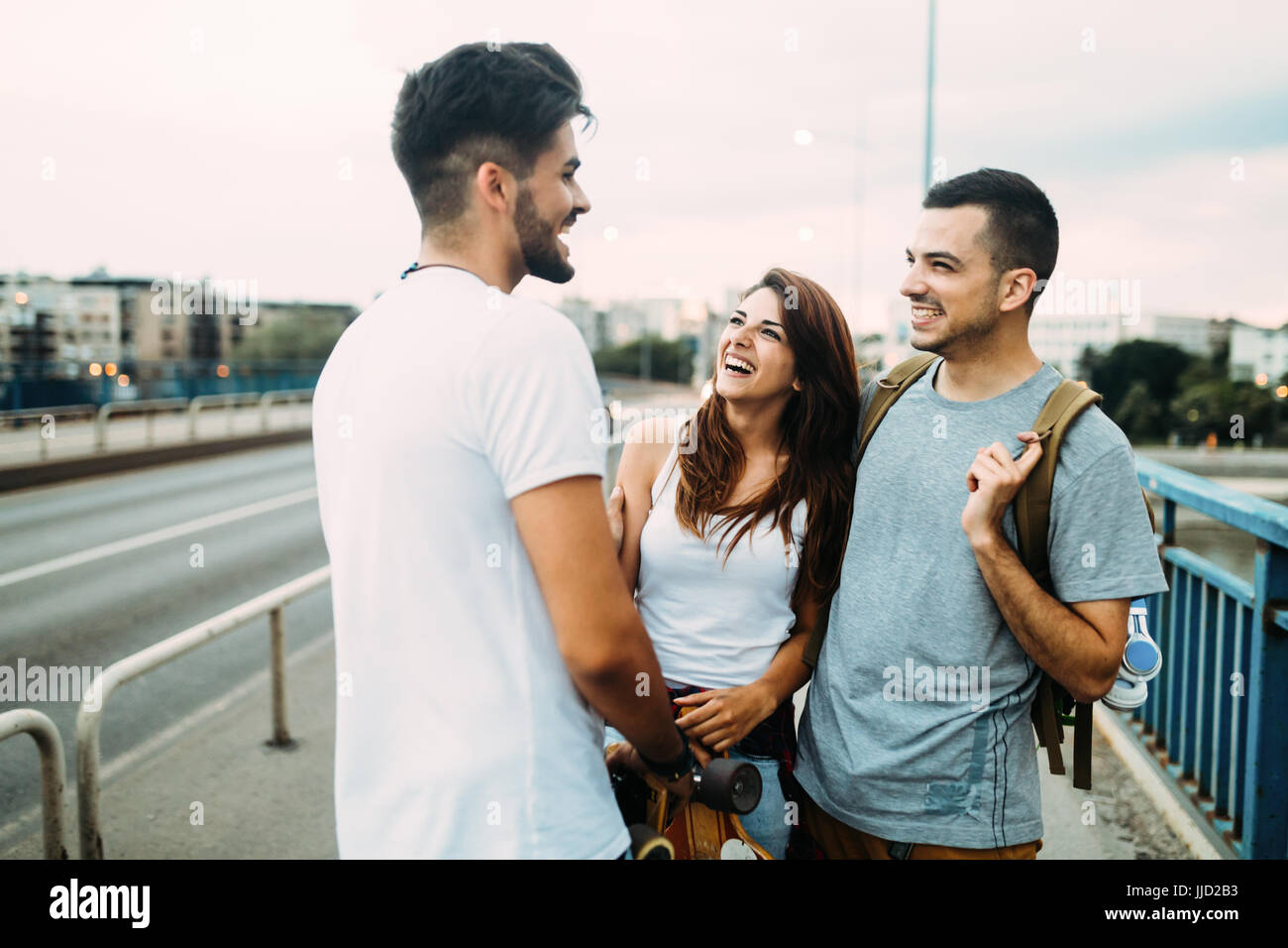 Group of happy friends hang out together Stock Photo - Alamy