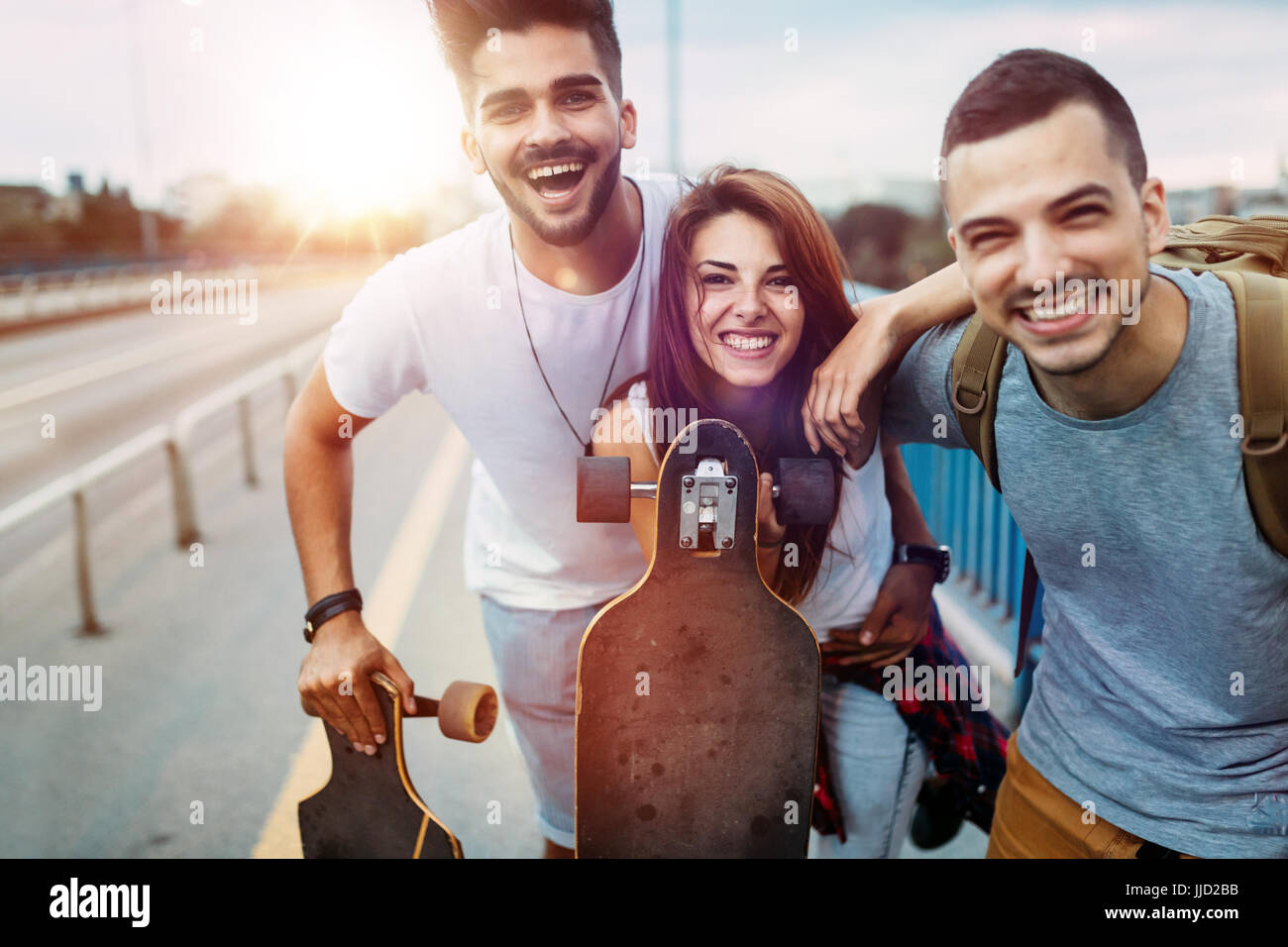 Group of happy friends hang out together Stock Photo - Alamy