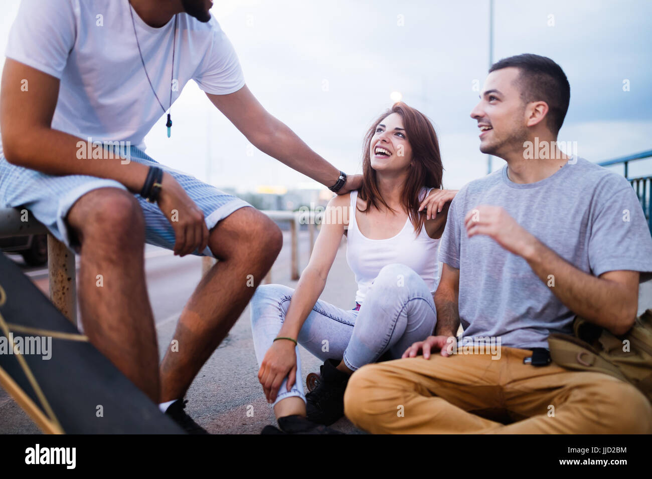Group of happy friends hang out together Stock Photo - Alamy