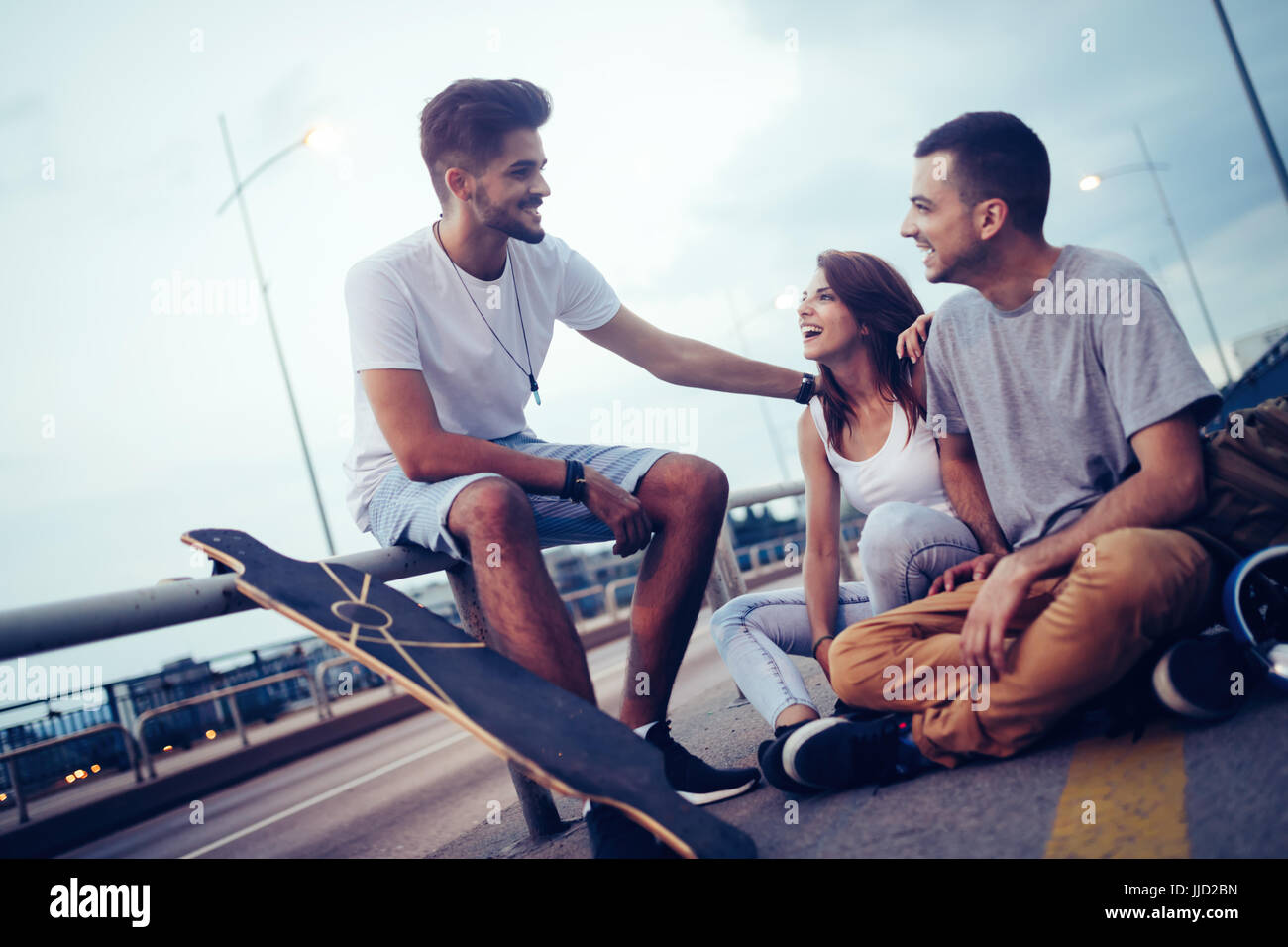 Group of happy friends hang out together Stock Photo - Alamy
